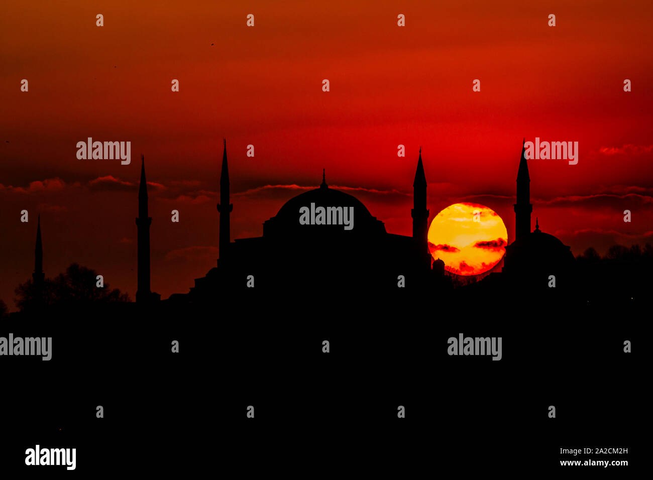 Cityscape of Istanbul with silhouettes of ancient mosques and minarets ...