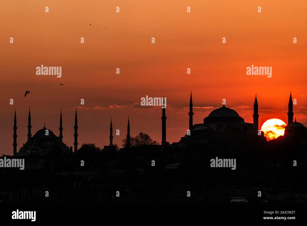 Cityscape of Istanbul with silhouettes of ancient mosques and minarets ...
