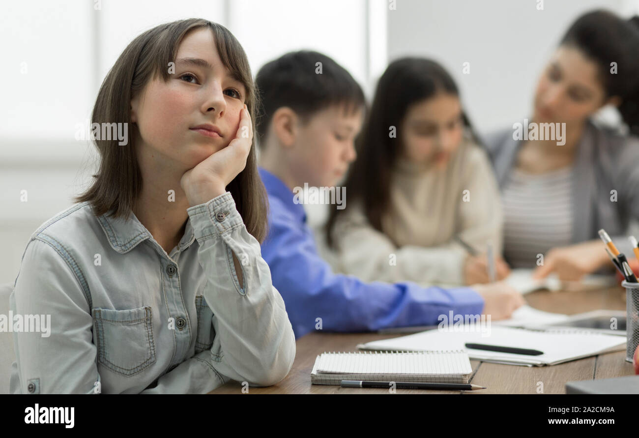 Young child thinking classroom hi-res stock photography and images - Alamy