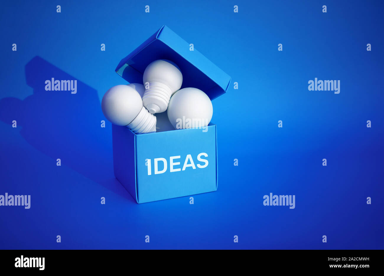 Ideas inspiration concepts with group of lightbulb in blue box on color ...
