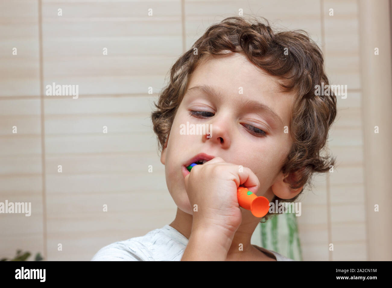 Teen boy brushing teeth hi-res stock photography and images - Alamy