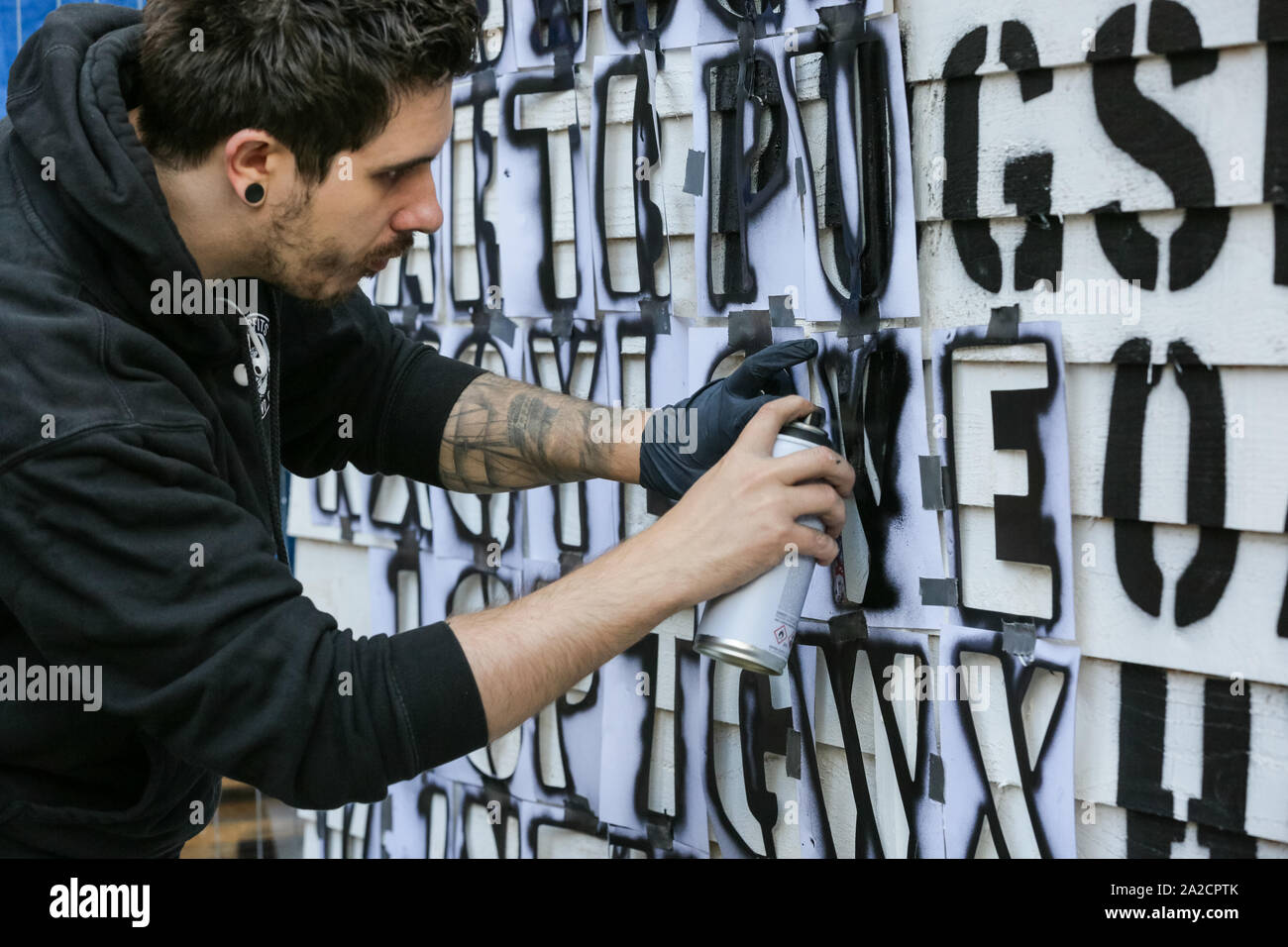 Chelsea Sorting Office, London, UK, 02 Oct 2019. An artist with Rich ...