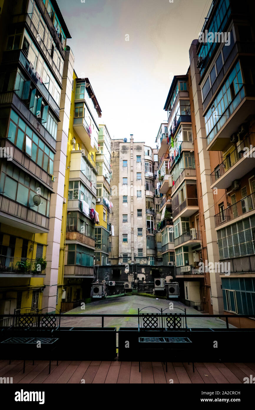 Alleys of a central Naples neighborhood with colorful terraces Stock ...