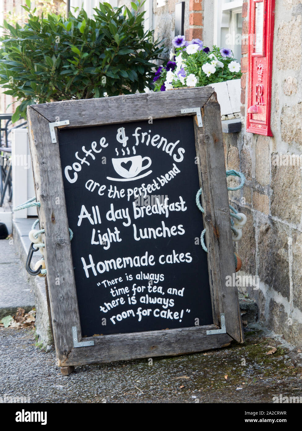 Sign outside a cafe at Charlestown Harbour, Cornwall, UK Stock Photo ...