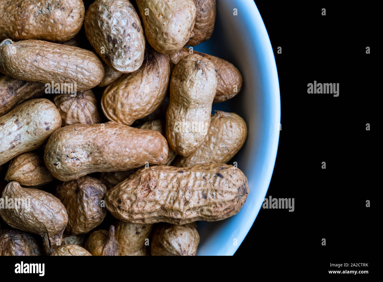 Peanut close up picture healthy food group background Stock Photo - Alamy