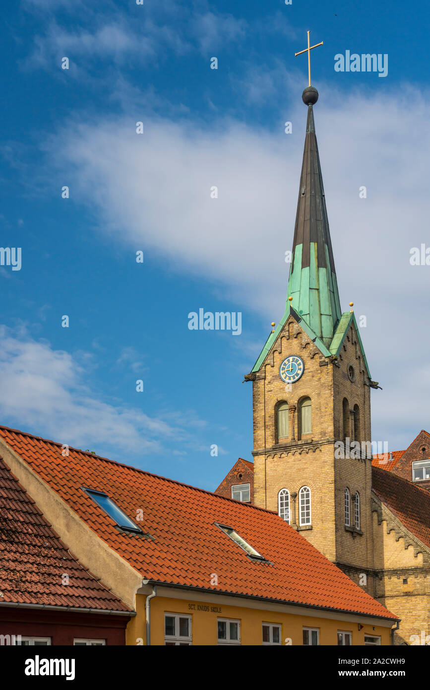 Exterior of the St. Knuds Roman Catholic Church and steeple in ...