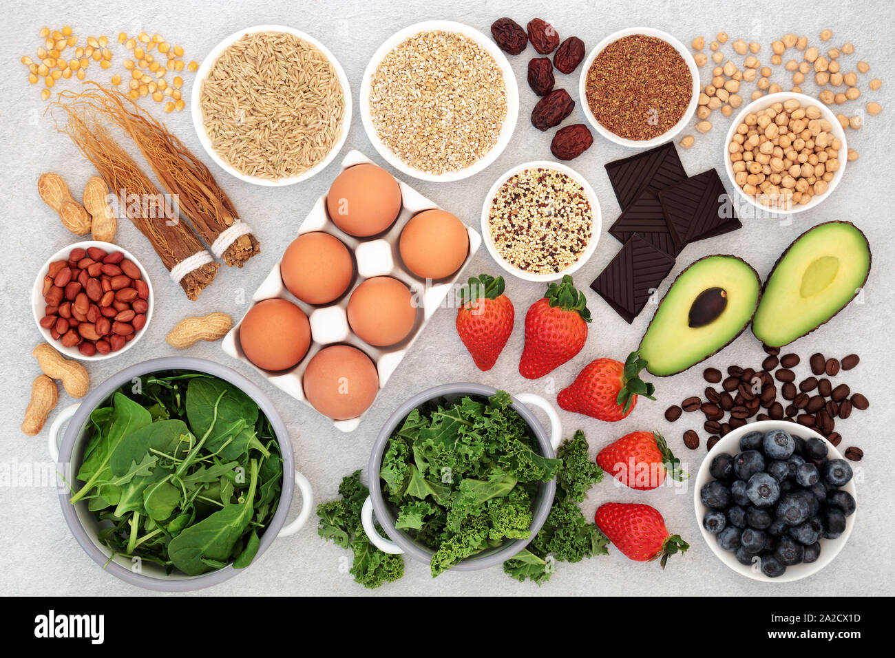 Health food for vitality, energy & fitness with vegetables, nuts, seeds ...