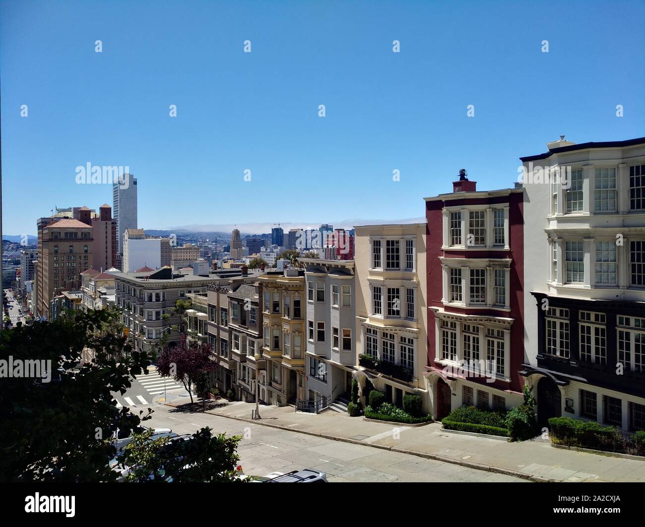 city street with houses downhill Stock Photo - Alamy