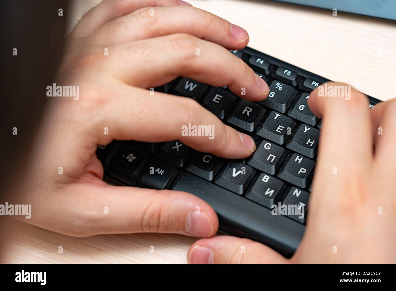 Replacing the alphabet on the keyboard. Stick English letters on the ...