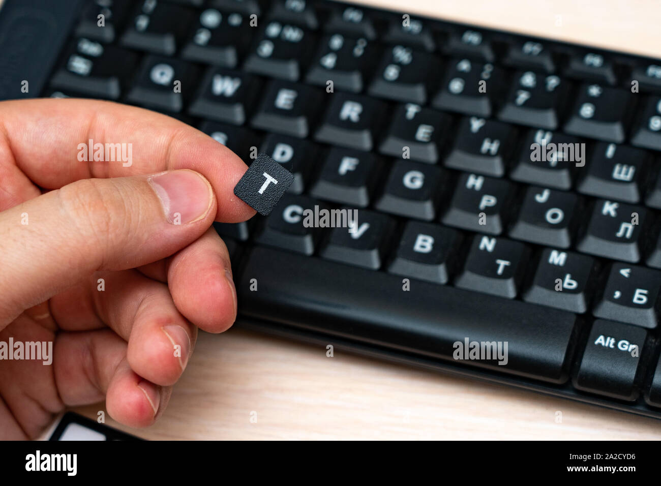 Replacing the alphabet on the keyboard. Stick English letters on the ...