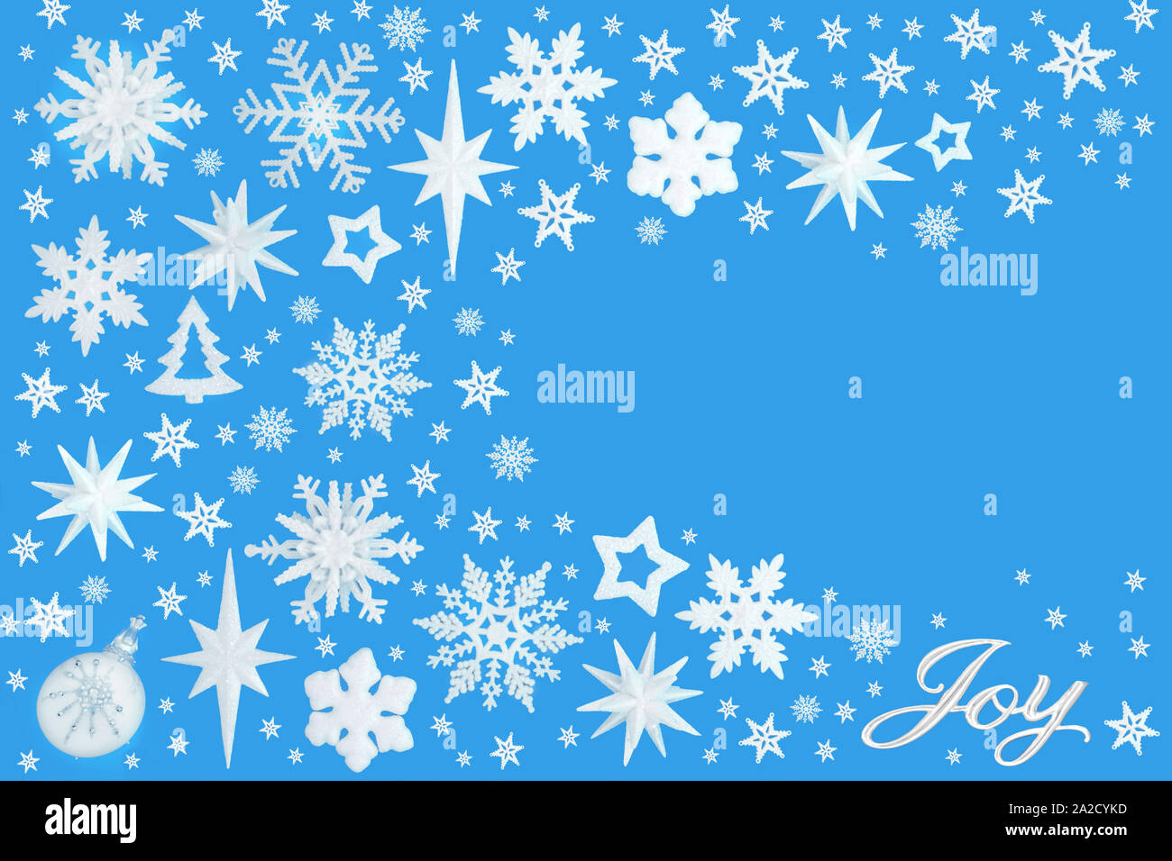 Christmas decorations with silver joy sign forming an abstract ...