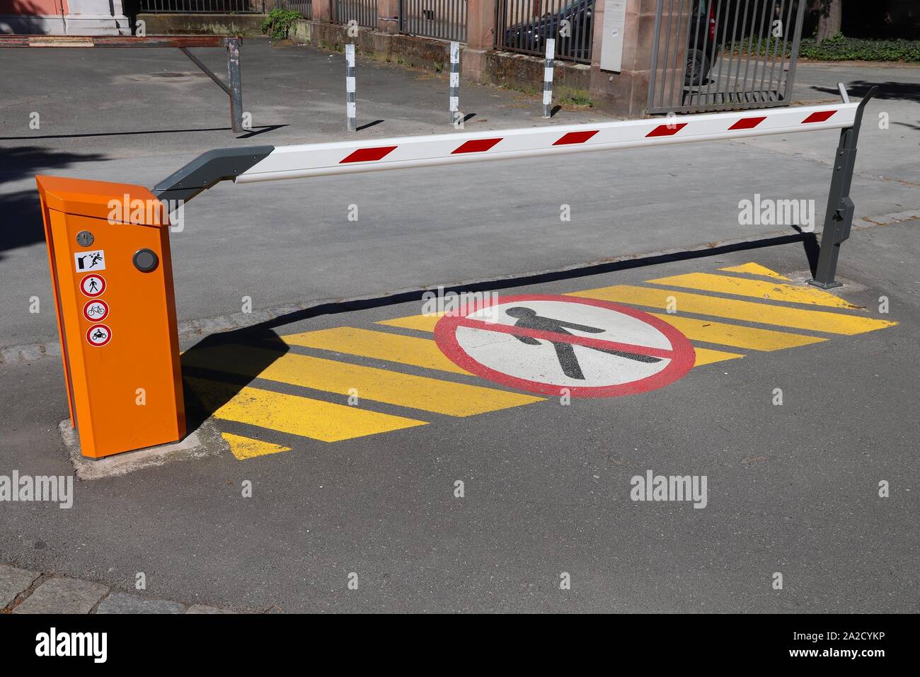 Car parking entrance automatic barrier. Generic red white gate barrier ...