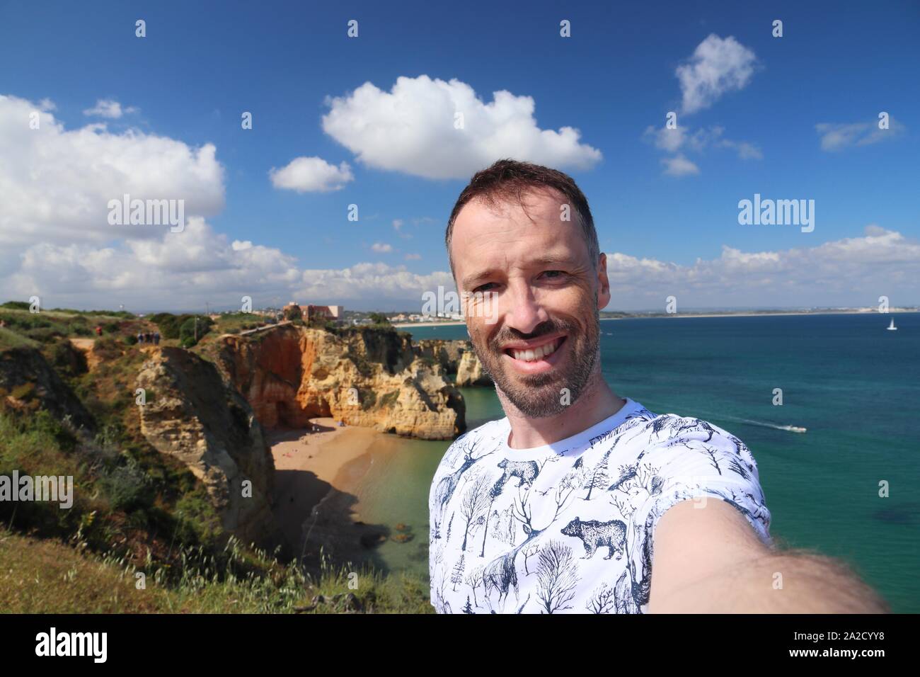 Tourist in Portugal. Traveler selfie of adult man in Algarve region ...