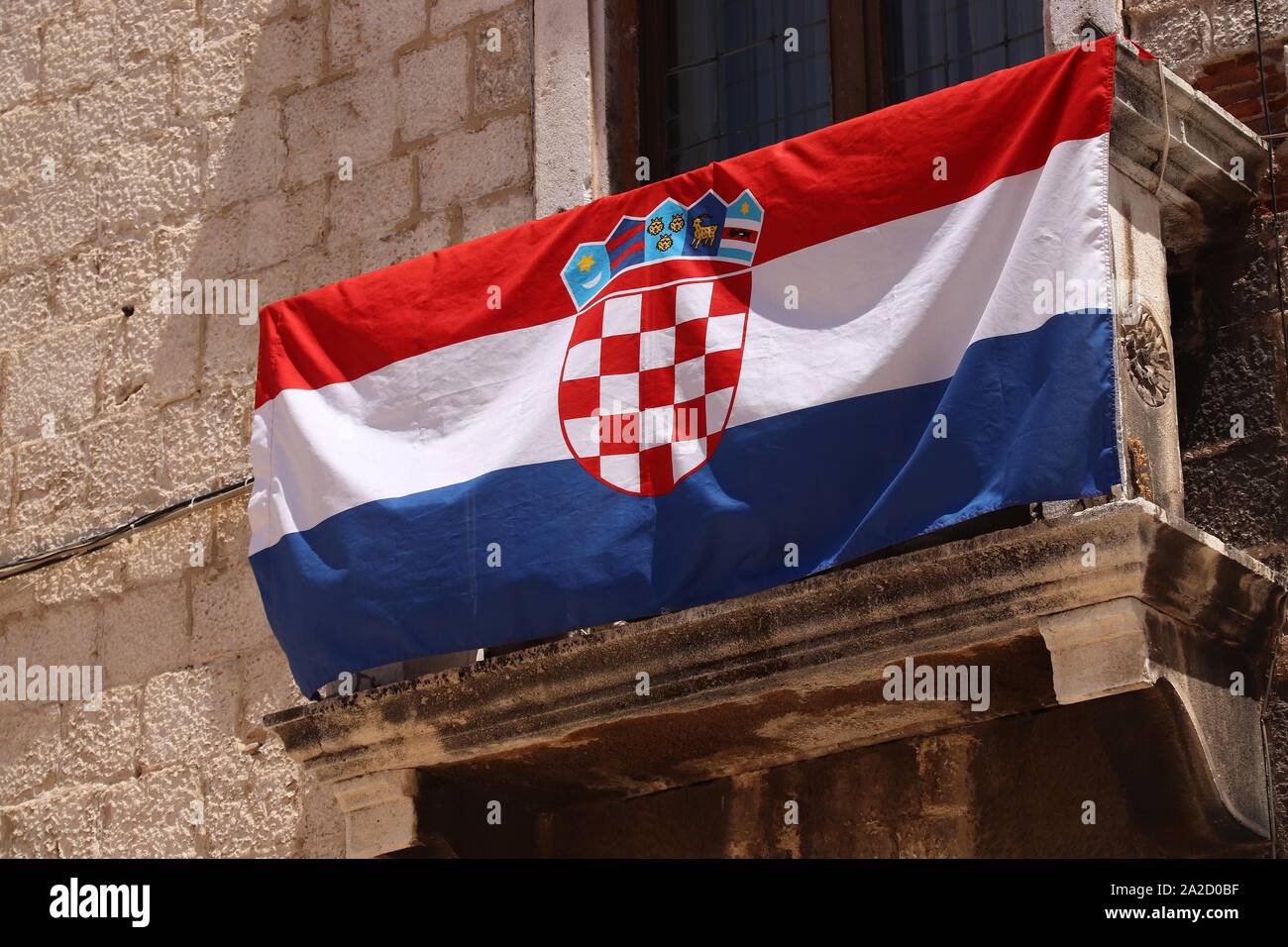 Flag of Croatia in Split Old Town. Croatian national colors Stock Photo ...
