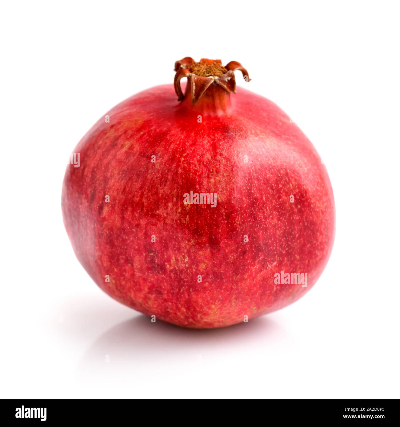 Single ripe pomegranate fruit isolated on white background Stock Photo ...