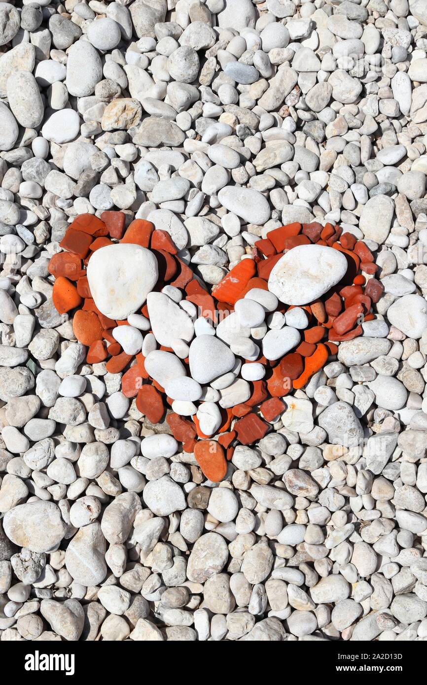 Heart made by pebbles hi-res stock photography and images - Alamy