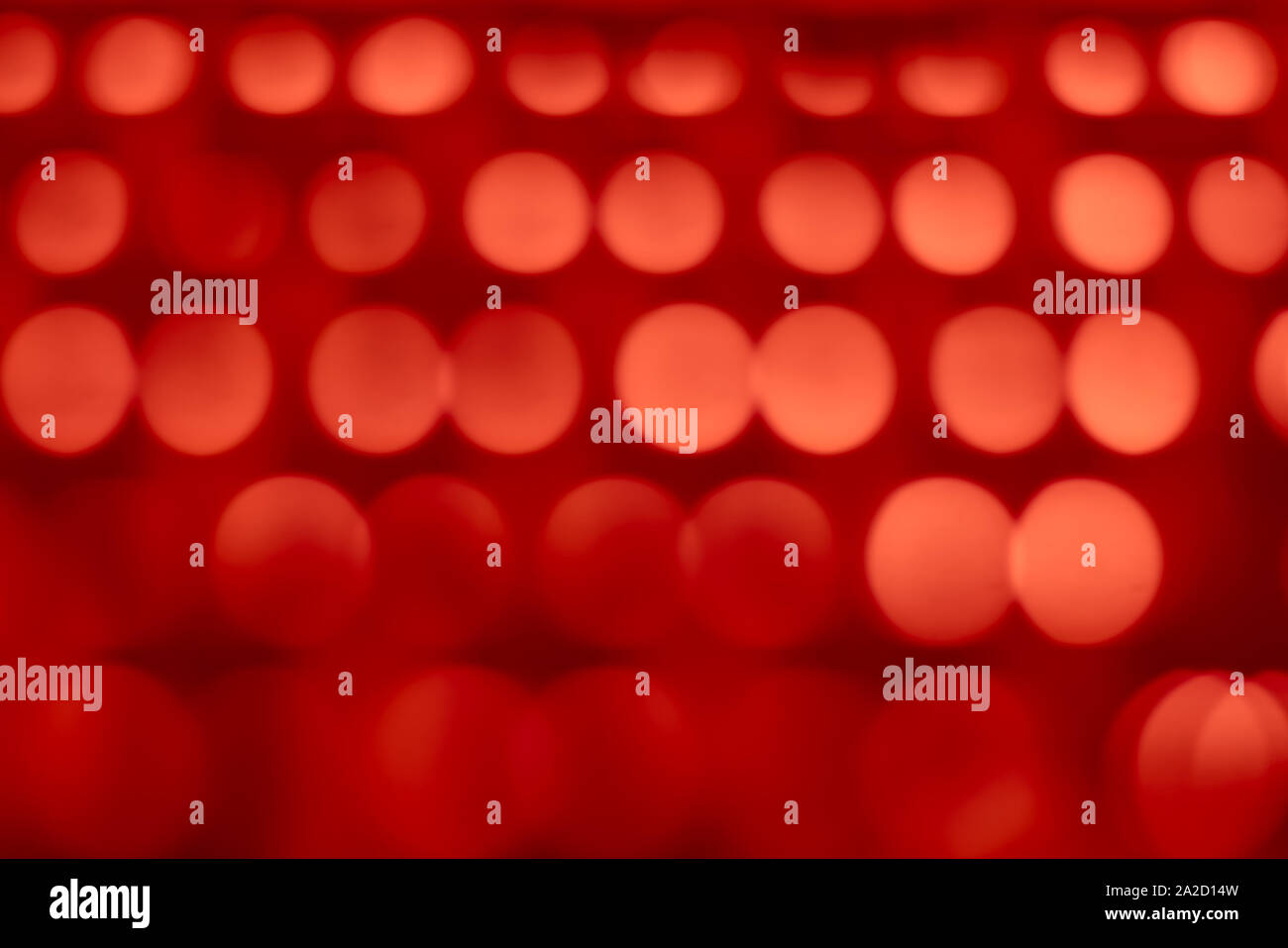 Abstract blood red bokeh background with soft focus lights in rows ...