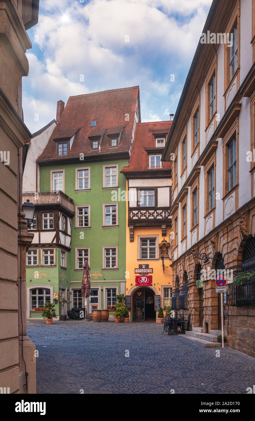 Bamberg, Germany - May 6, 2019: Old town narrow street with picturesque ...