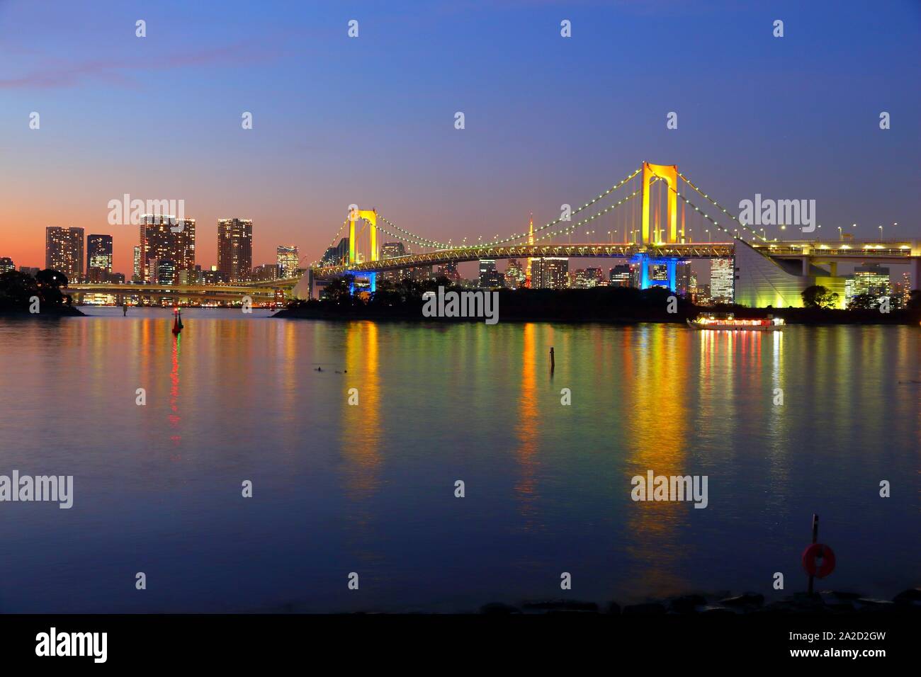 Rainbow Bridge in Tokyo, Japan. Night city view with Shibaura district ...