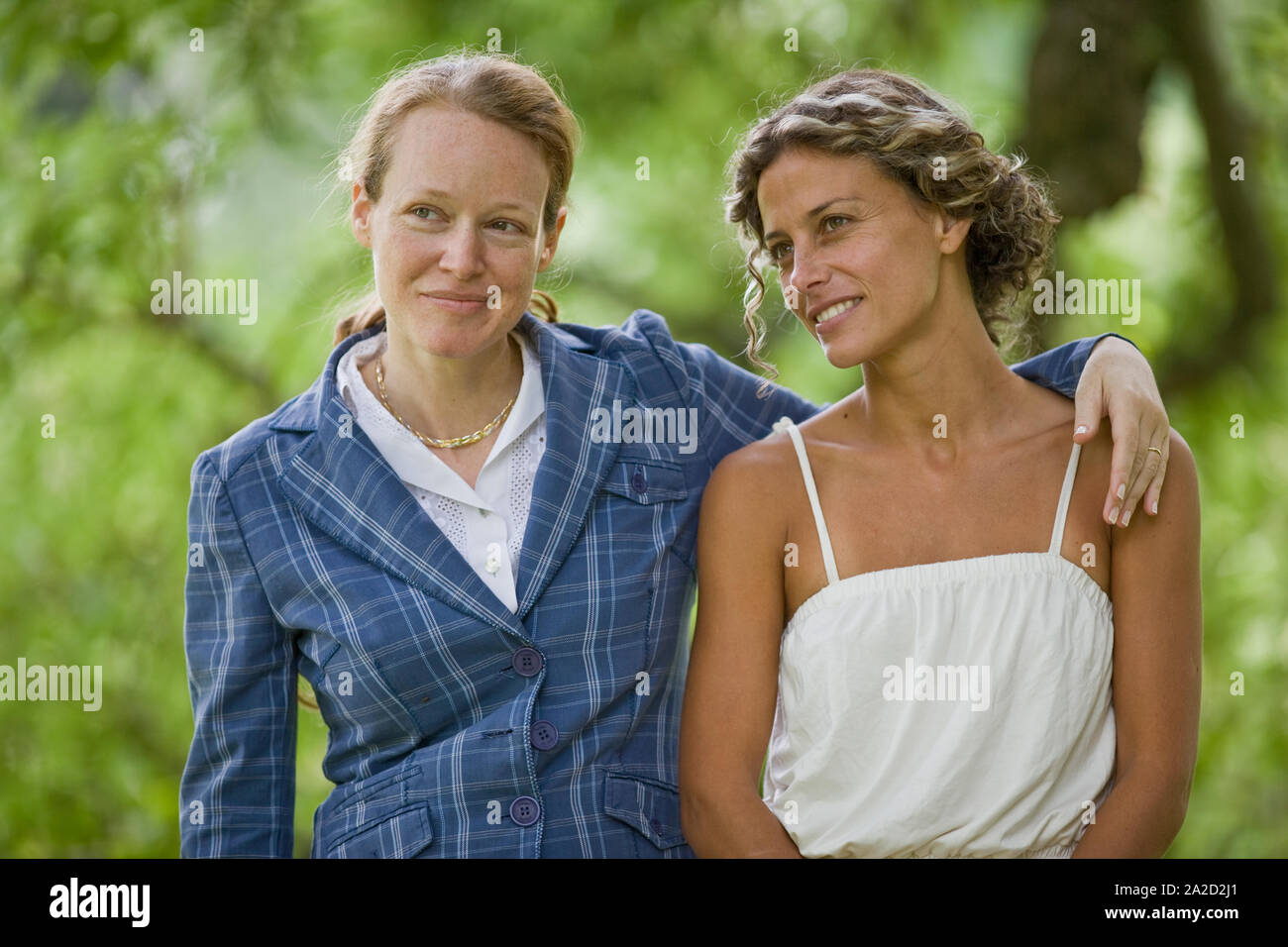 Woman resting on friends shoulder hi-res stock photography and images ...