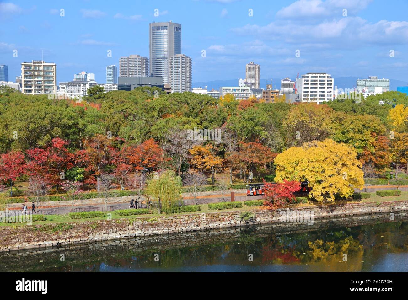 Japanese autumn. Osaka, Japan - city skyline and Castle Park view with ...
