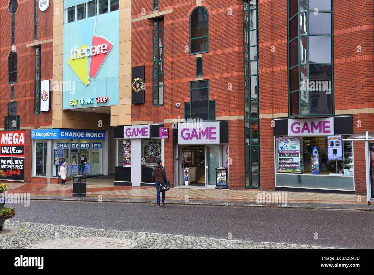 LEEDS, UK - JULY 11, 2016: People walk by The Core shopping mall in ...