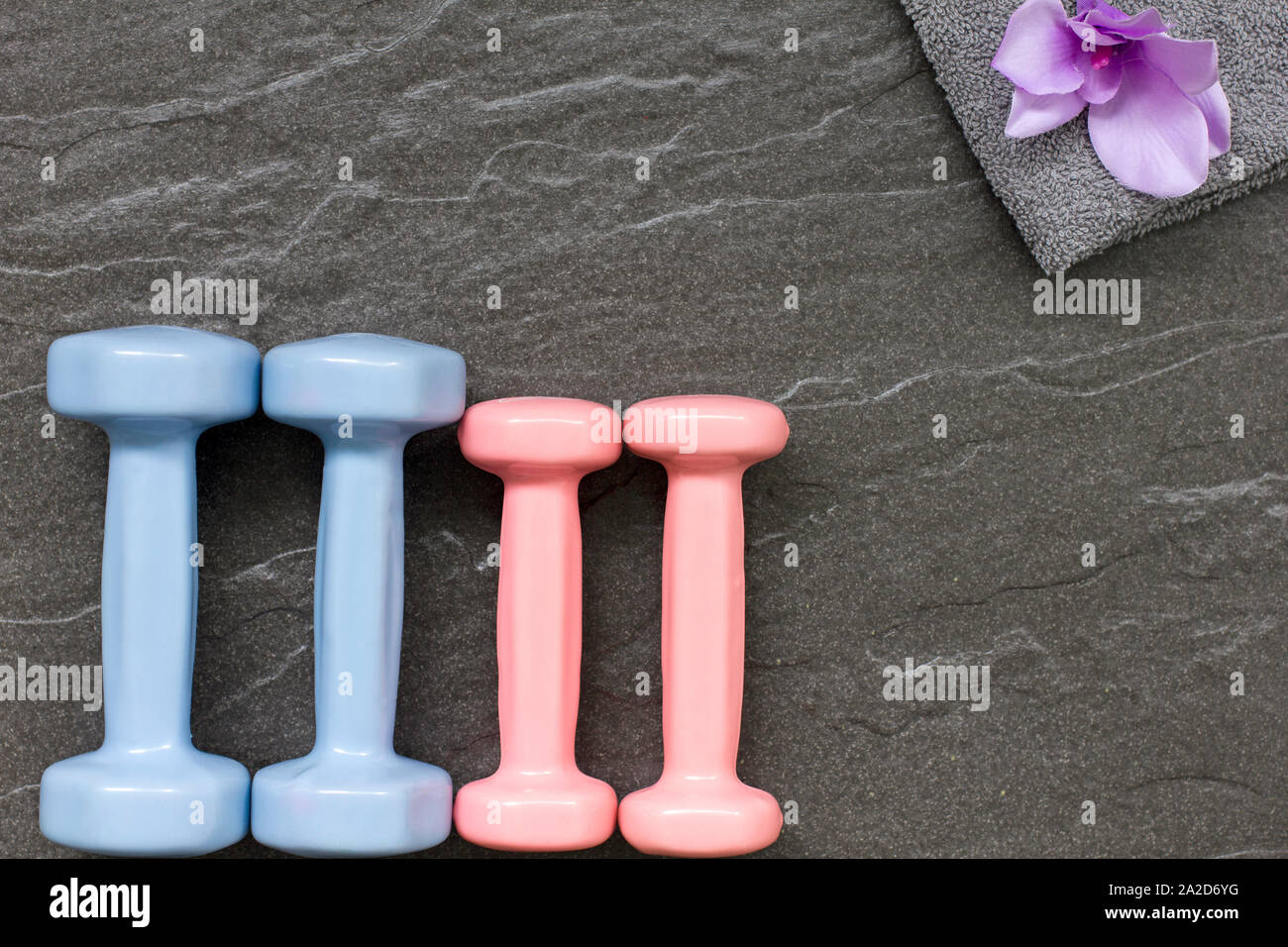 Still life of fitness workout scene with coloured weights Stock Photo ...