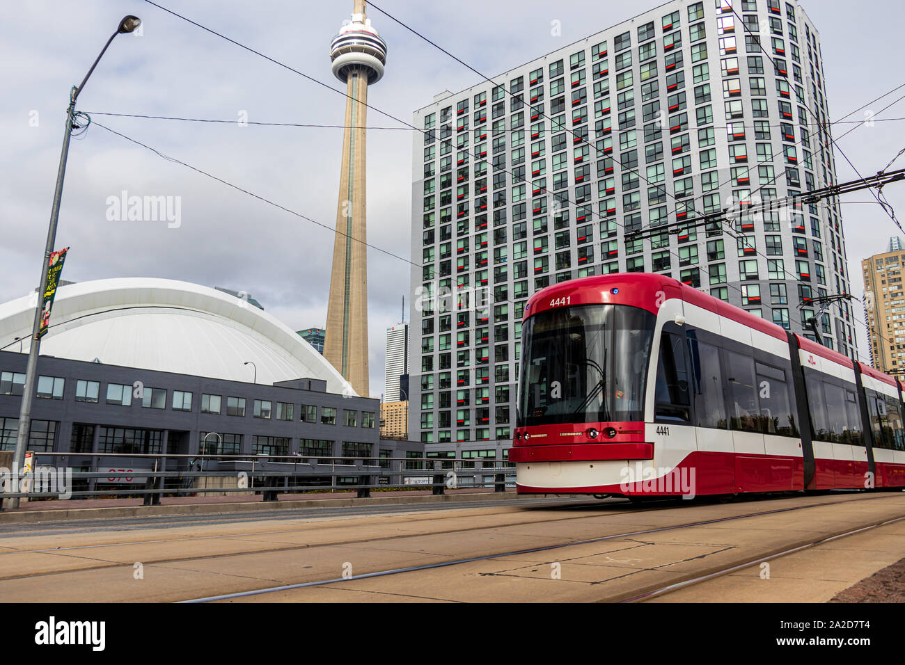 TTC (Toronto Transit Commission) streetcar passing the Rogers Centre ...