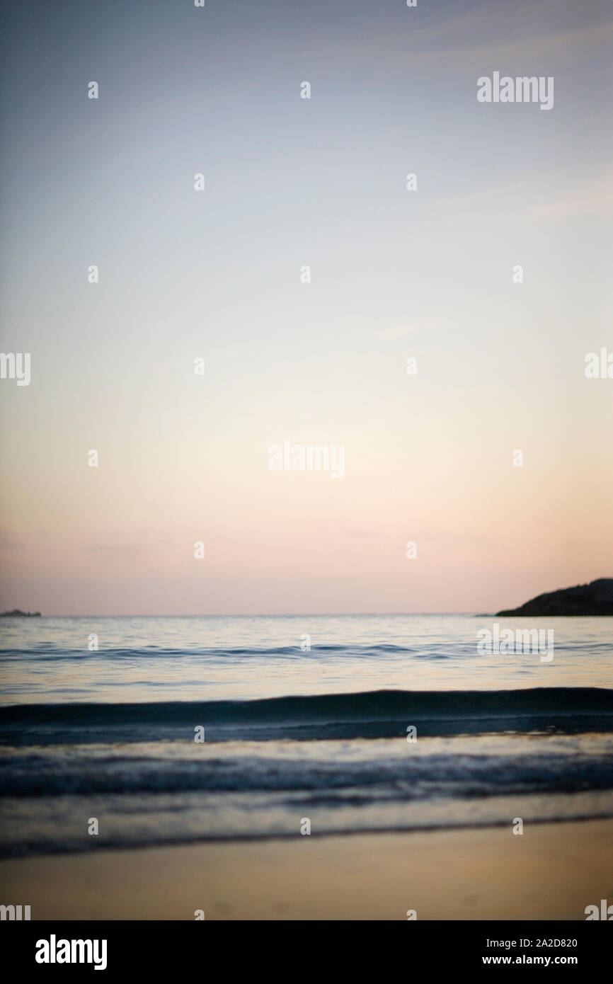 Sunset on beach waves breaking hi-res stock photography and images - Alamy