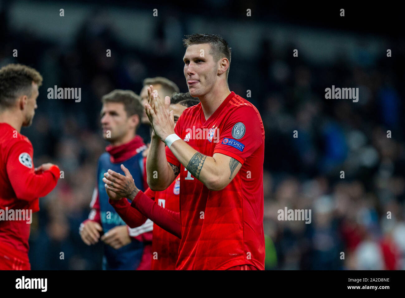 Niklas Sule of Bayern Munich claps the fans after a UEFA Champions ...