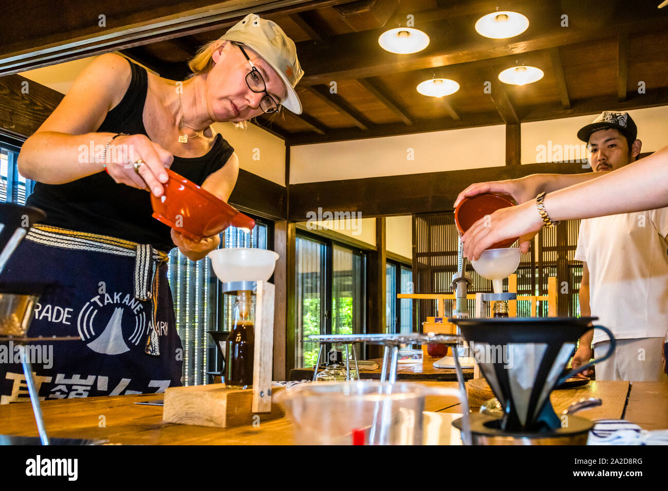 Under the eyes of Shoyu Master Shohei, the soy sauce is now heated to ...