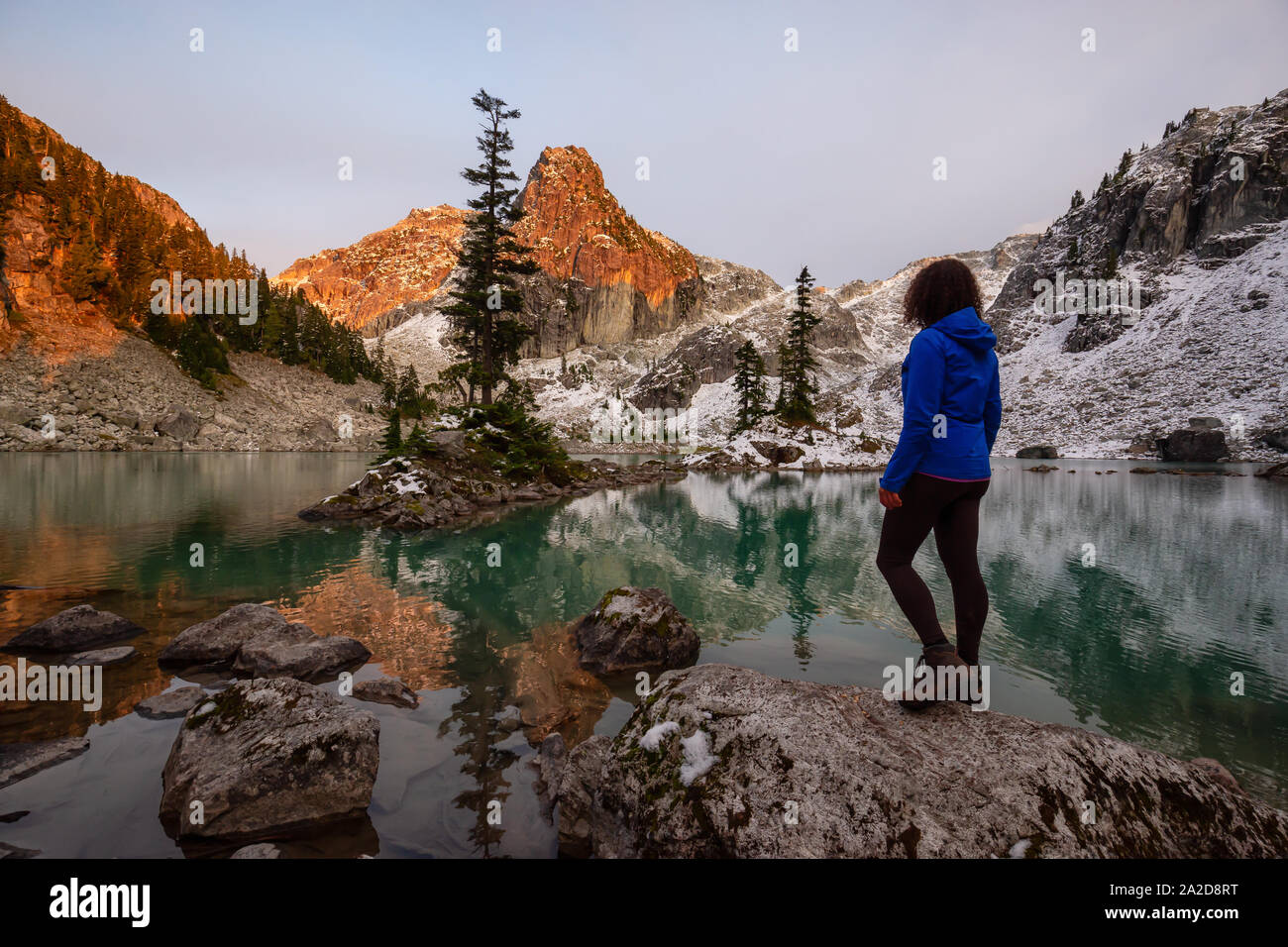 Adventurous Girl enjoying the View of a Glacier Lake in the Canadian ...