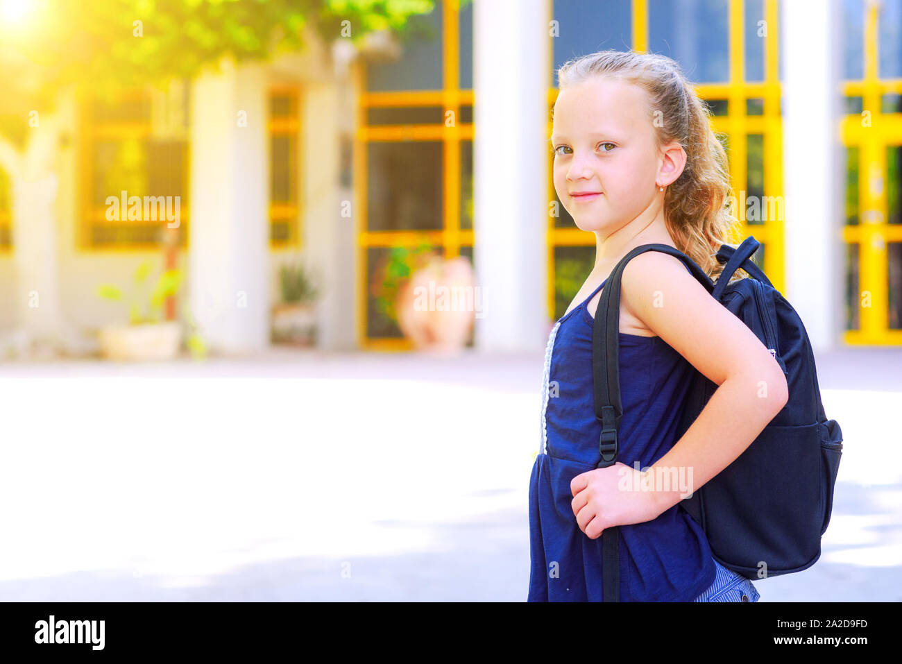 Portrair Happy smiling kid Back to school. Child little freckles girl ...