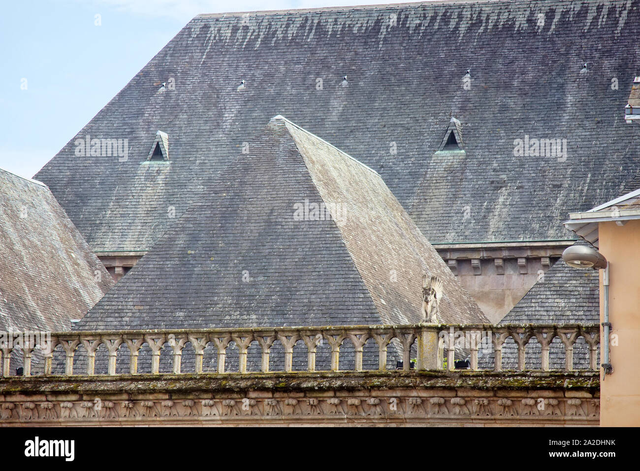 old roof tiles with Dormer Windows, pyramids, statues and balustrade ...