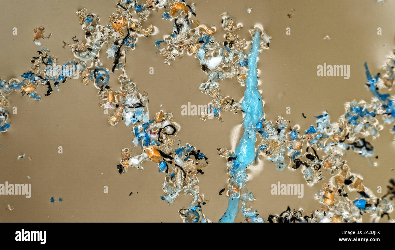 Plastic gets into water basin and gradually destroyed by waves and sun ...
