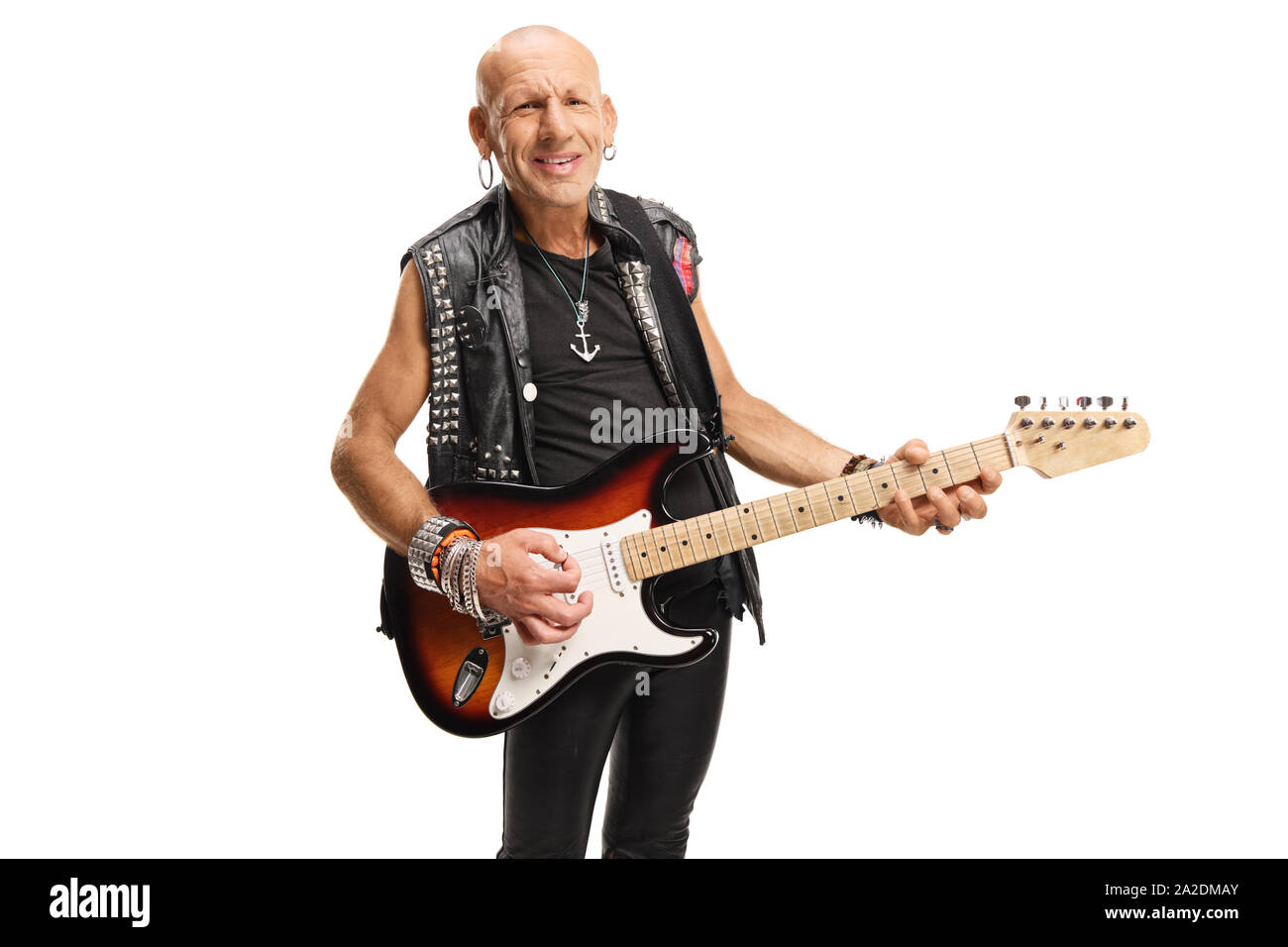 Cheerful rock musician playing an electric guitar isolated on white ...