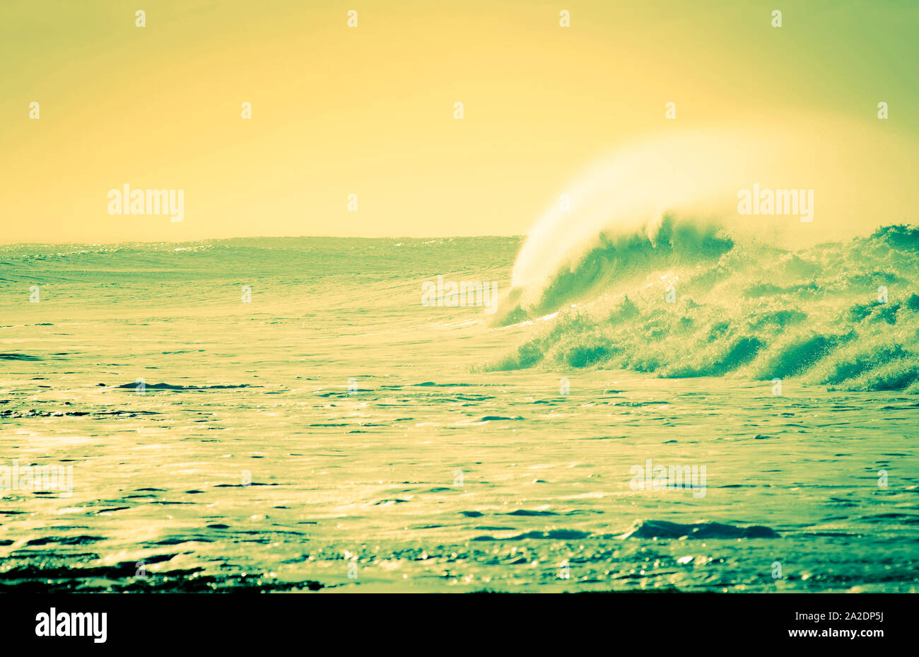 Large wave breaking out to sea Stock Photo - Alamy