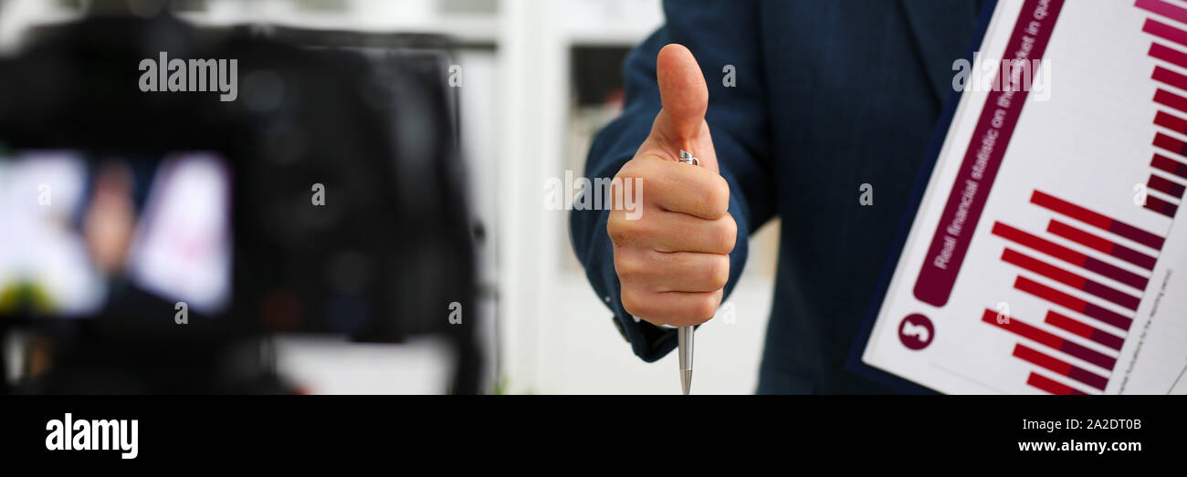 Male in suit and tie show confirm sign Stock Photo - Alamy