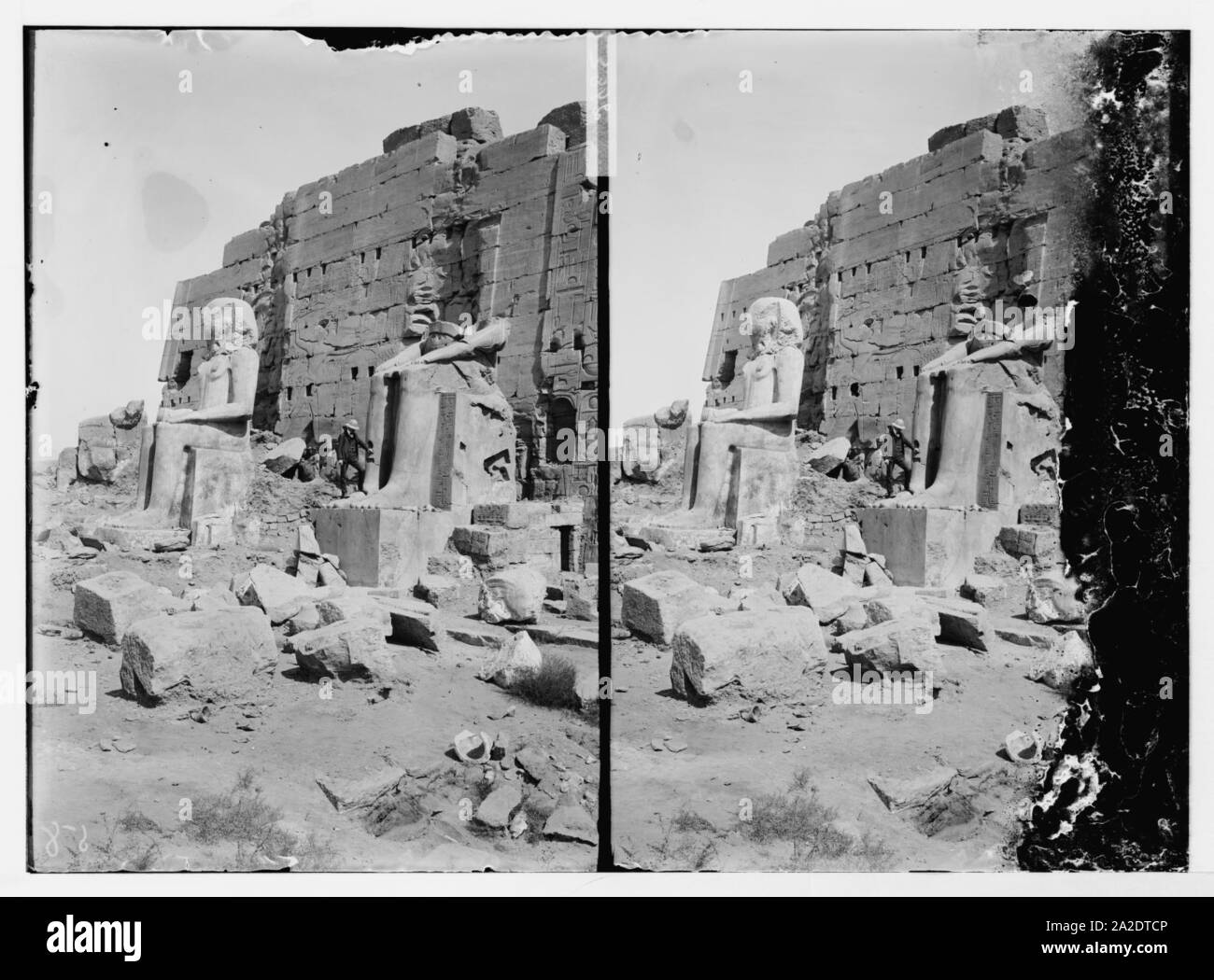 Egyptian views; Thebes. Statues of kings behind 8th pylon Stock Photo ...