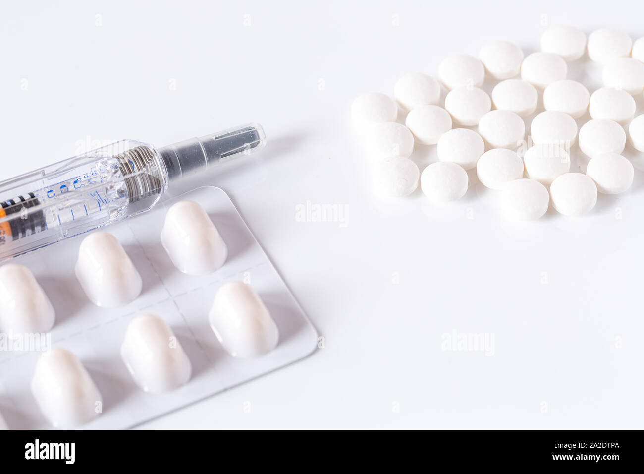 A large number of tablets. Prescription Medicine. White pills. Shopping ...