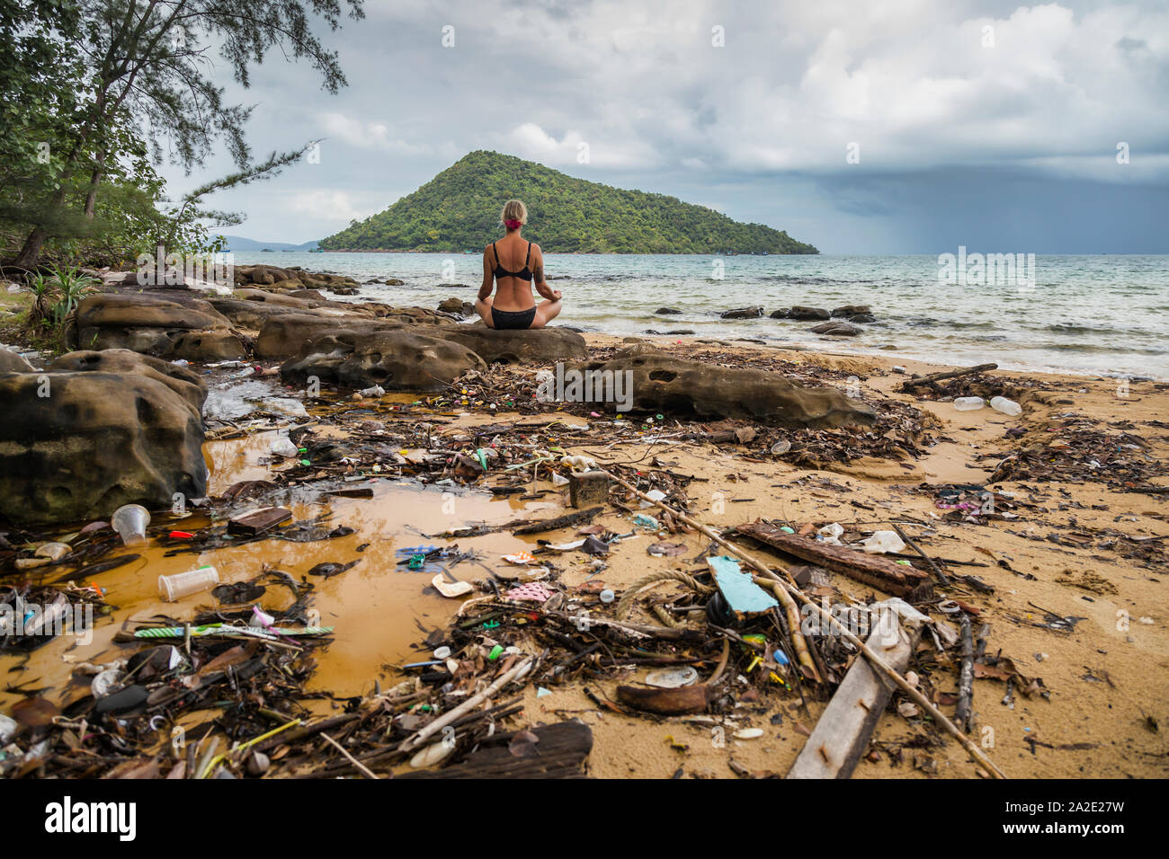 woman on the littered beach in cambodia Stock Photo - Alamy