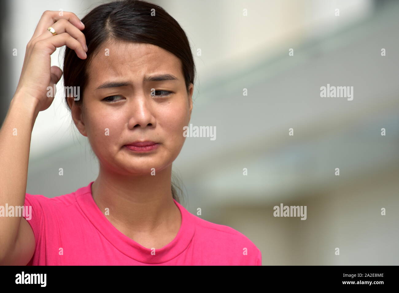 A Female And Confusion Stock Photo - Alamy
