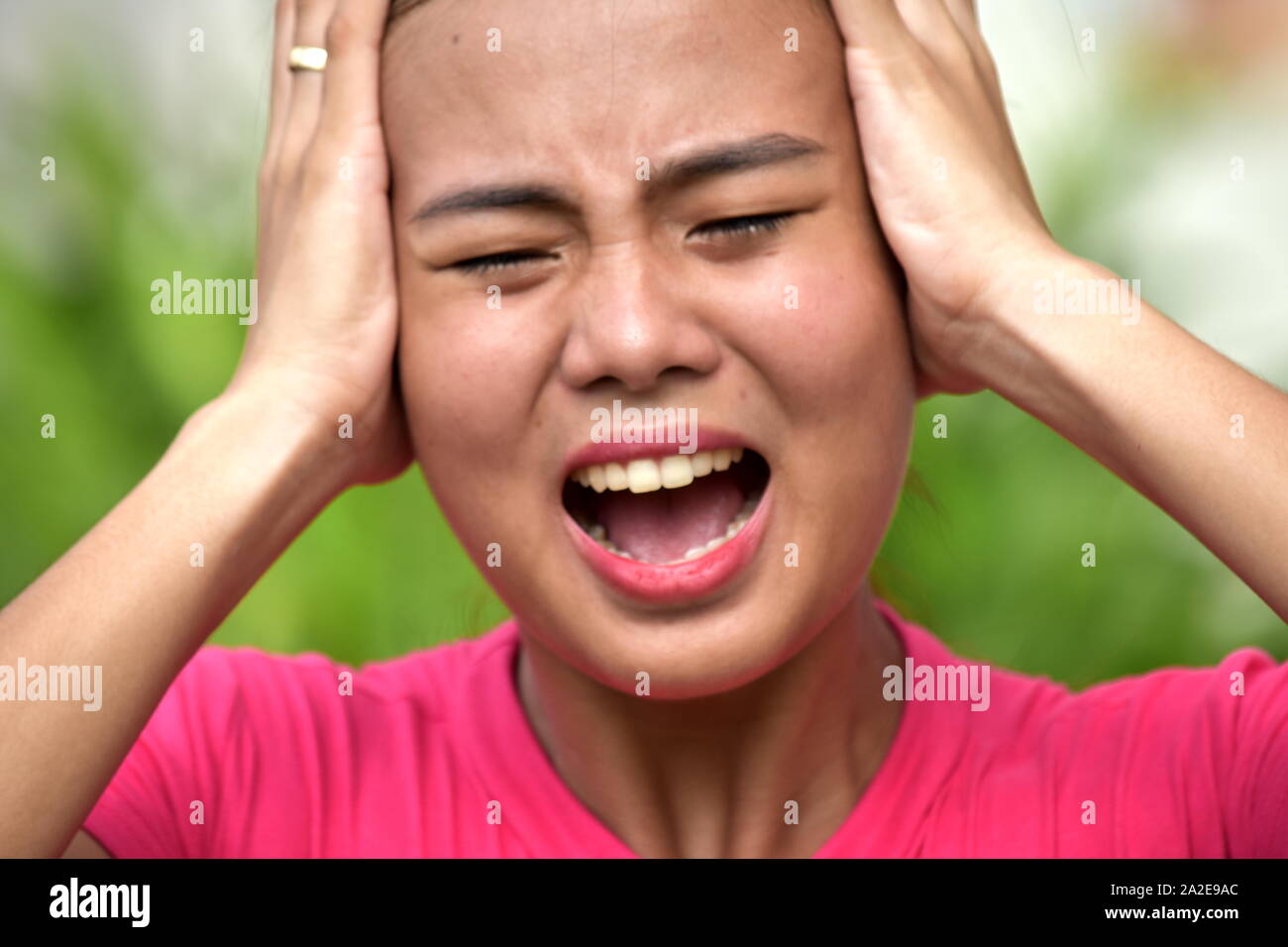 A Quiet Adult Female Stock Photo - Alamy