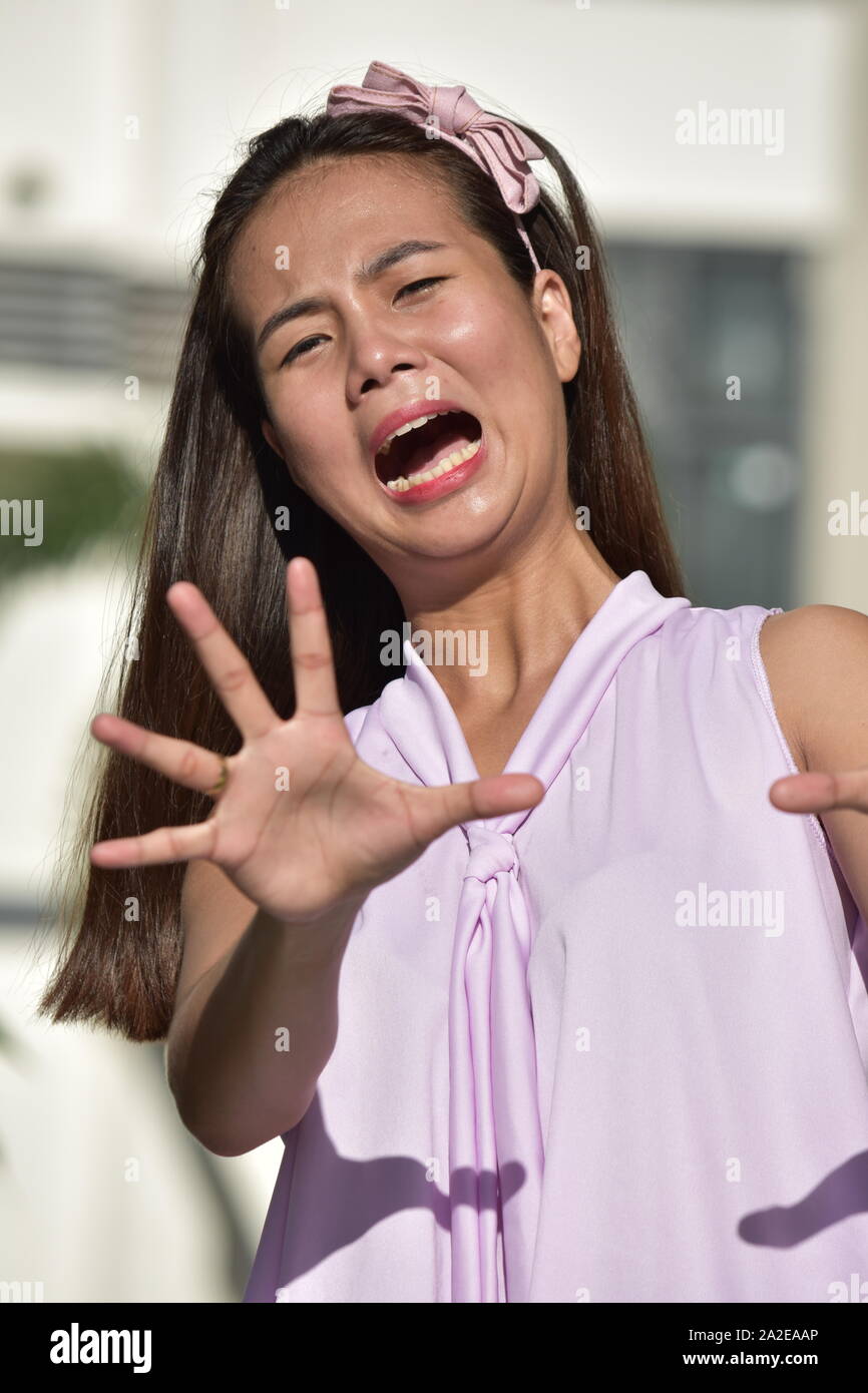A Fearful Adult Female Stock Photo - Alamy