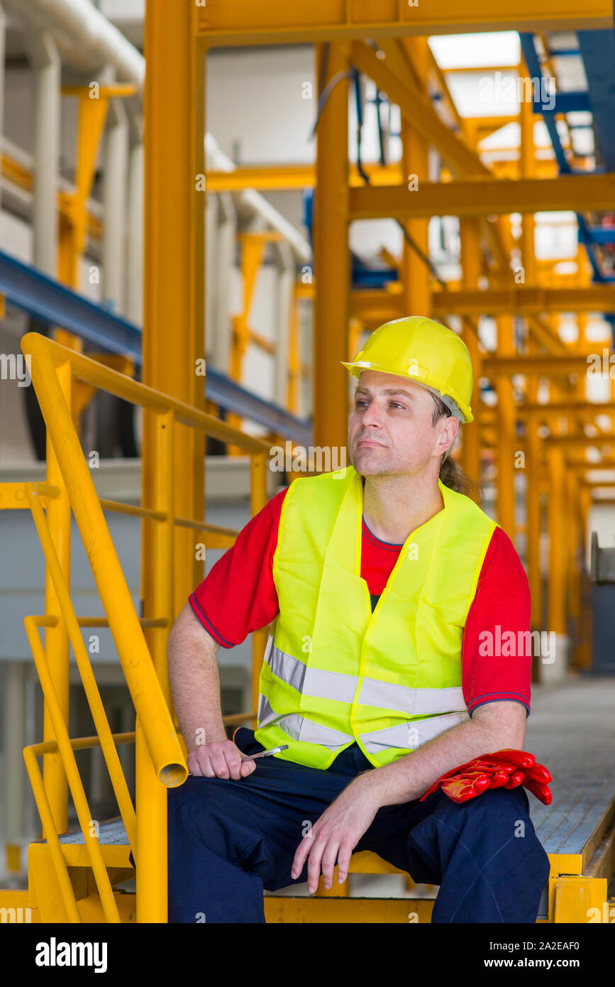 Workman resting indoors hi-res stock photography and images - Alamy