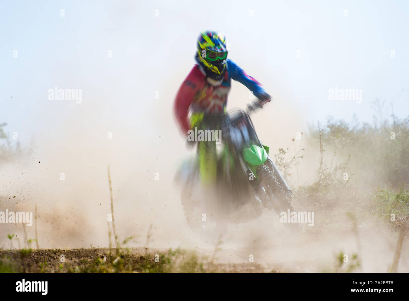 Motorcycle rider during motocross race with zoom effect Stock Photo - Alamy