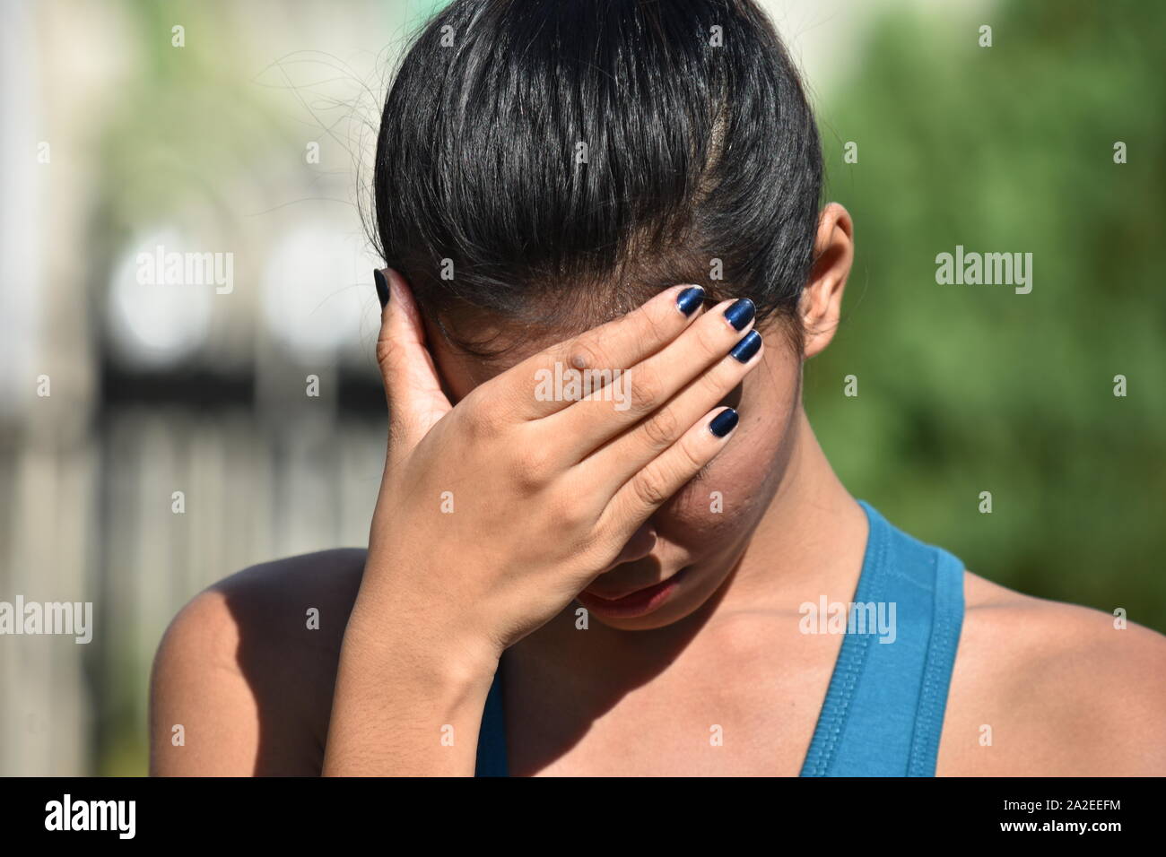 Beautiful sad female filipino hi-res stock photography and images - Alamy