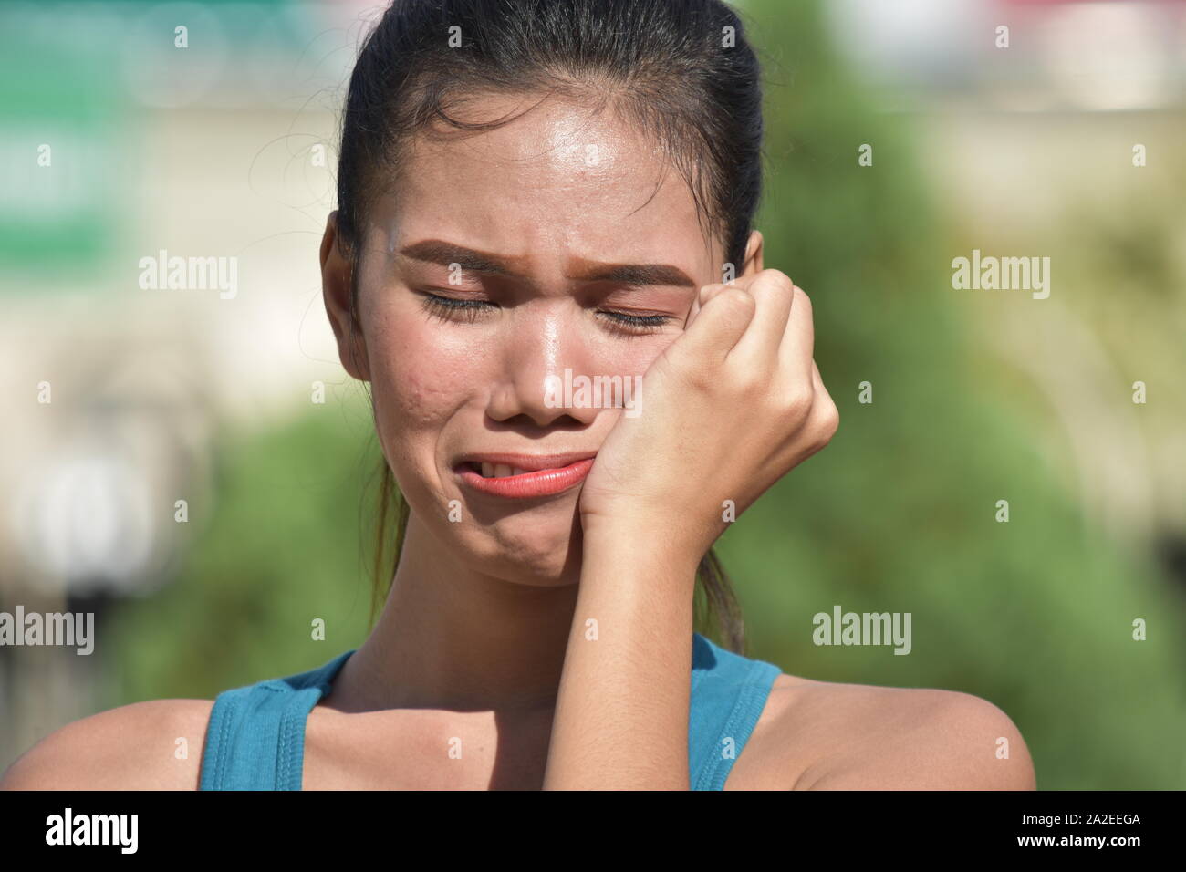 A Crying Filipina Female Stock Photo - Alamy