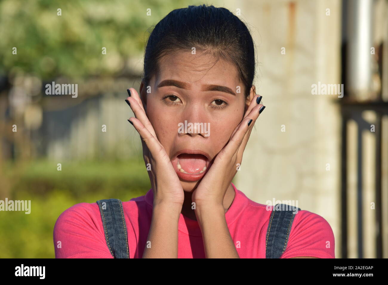 A Startled Female Woman Stock Photo - Alamy