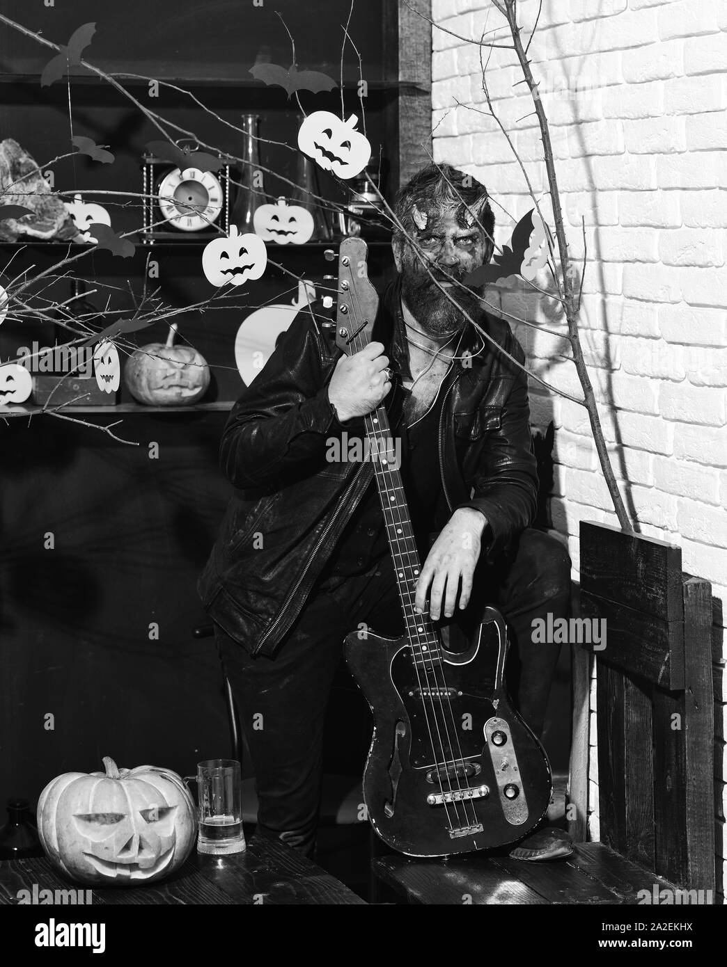 Devil or monster playing instrument. Halloween party concept. Man ...